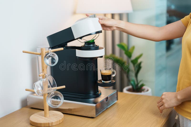 Hand Making Espresso Coffee by Coffee Maker Machine with Capsule of ...