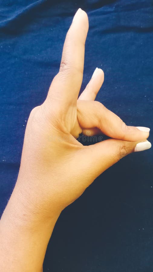 A Hand Making Face of a Dog Face Stock Photo - Image of yellow ...