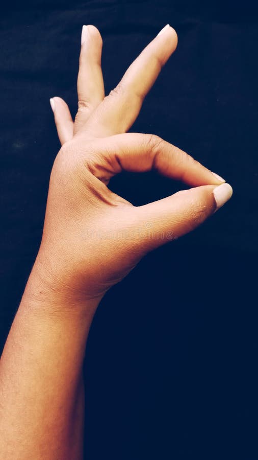 A Hand Making Shape of a Peacock Head Stock Photo - Image of shape ...