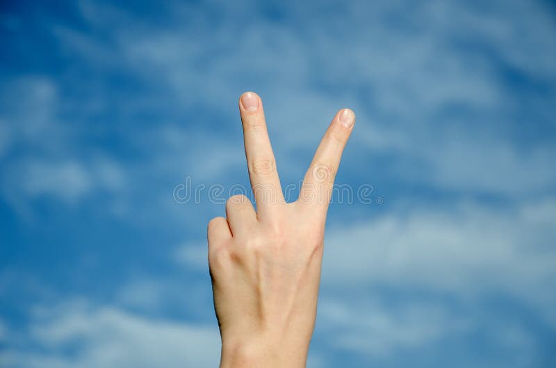 Hand Making Victory Sign on Green Grass Background Stock Image - Image ...