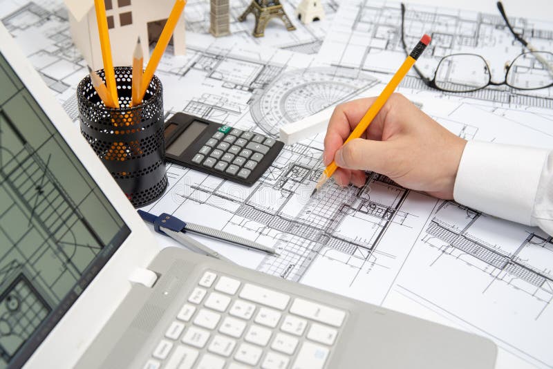 The Hand of a Male Architect Drawing a Design Using a Pencil. Stock ...