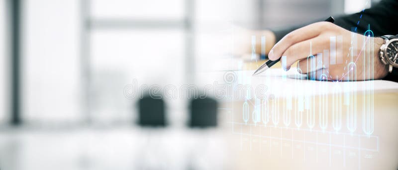 Hand of a Man Analyzing Financial Data with Pen on a Desk, Digital ...