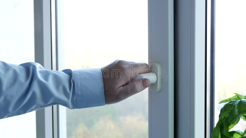 Hand of a Man Closing a Window from the Office Stock Video - Video of ...