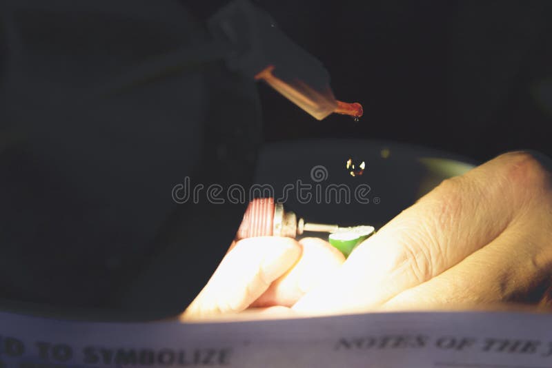 Hand of a Man Crafting a Traditional Emblem Stock Photo - Image of ...