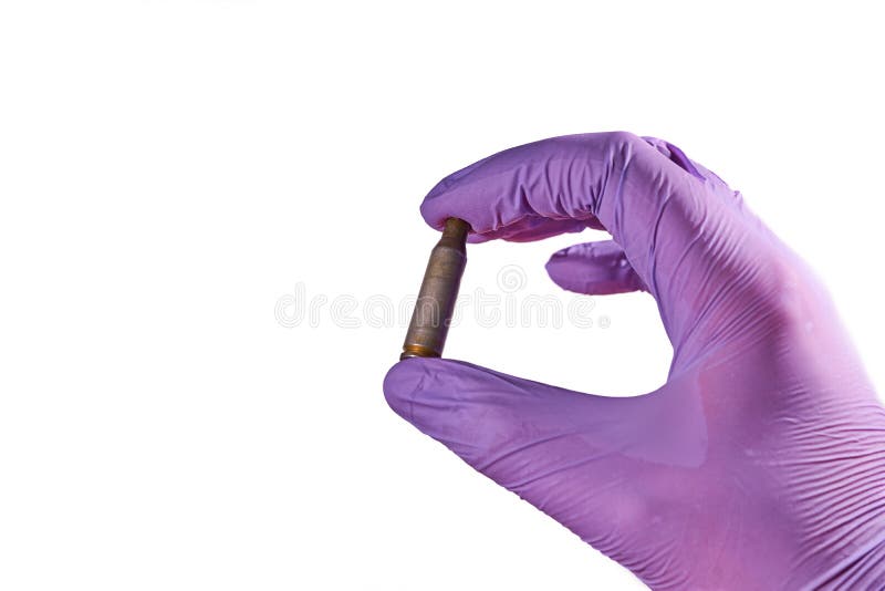 The Hand of a Man in a Glove Holding a Bullet Shell Stock Image - Image ...