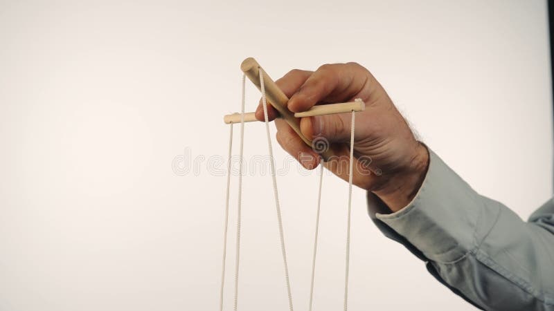 The Puppeteer S Hand Controls the Puppet with a Wooden Manipulator and ...