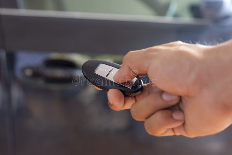 Hand Man Hode Car Remote for Open the Car. Soft Focus and Focus ...