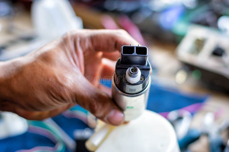 Hand of Man Hold Fuel Pump Motor. Selective Focus Stock Photo - Image ...
