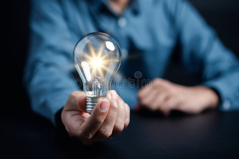 Hand Man Holding Illuminated Lightbulb, Idea, Innovation and ...