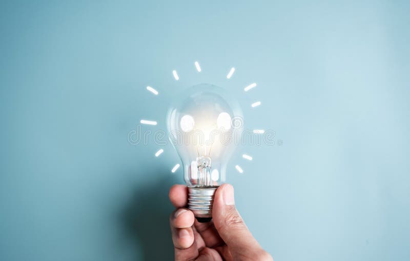 Hand Man Holding Illuminated Lightbulb, Idea, Innovation and ...