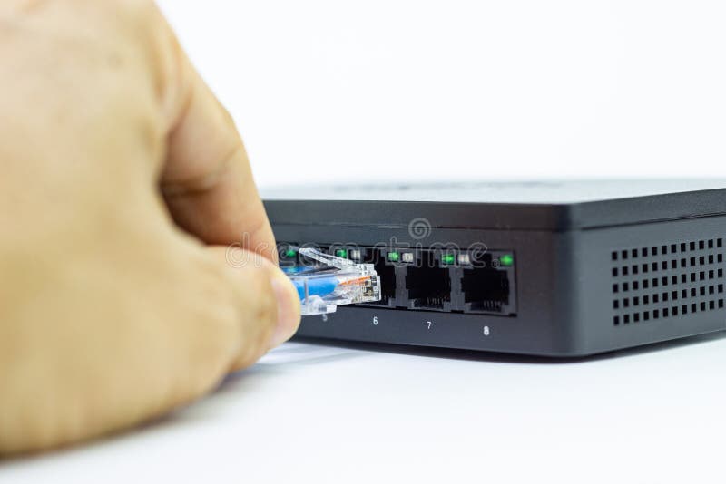 Hand of Man Holding the Network Cables To Connect Lan Port Stock Image ... Hand of Man Holding the Network Cables To Connect Lan Port Stock Image ...
