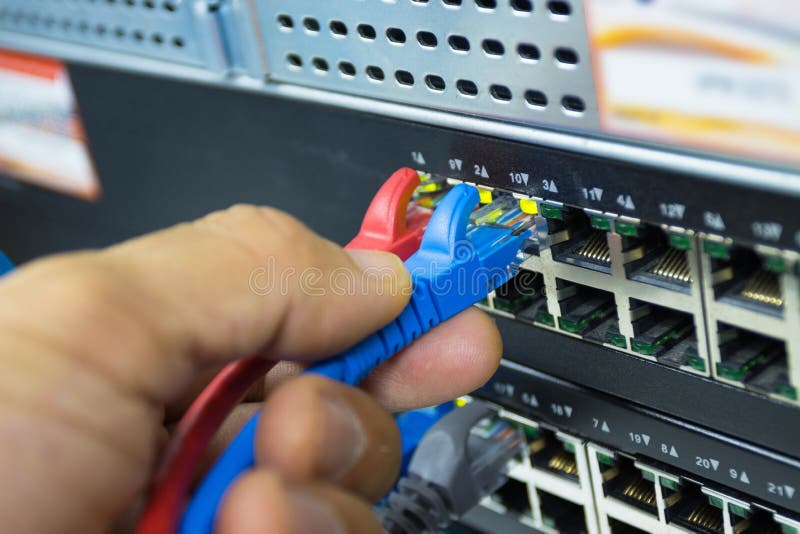 Hand of Man Holding the Network Cables To Connect Lan Port Stock Photo ... Hand of Man Holding the Network Cables To Connect Lan Port Stock Photo ...