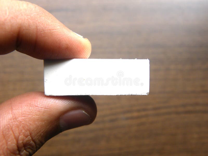 Hand Holding Small White Eraser Stock Image - Image of clean, cube ...