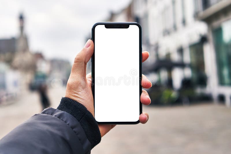 Hand of Man Holding Smartphone at Street Stock Image - Image of device ...