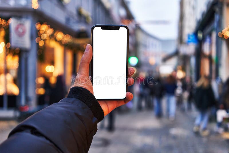 Hand of Man Holding Smartphone at Street Stock Photo - Image of white ...