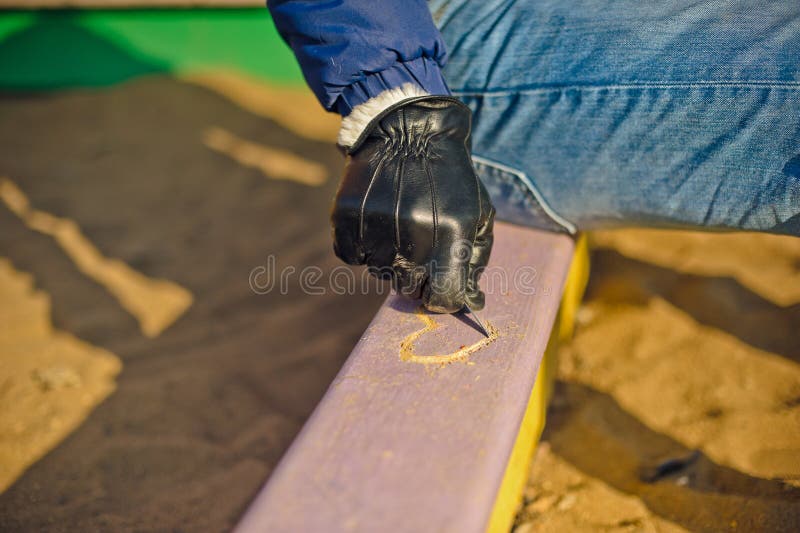 Hand of Man with a Knife Cuts Heart Stock Photo - Image of hands, heart ...