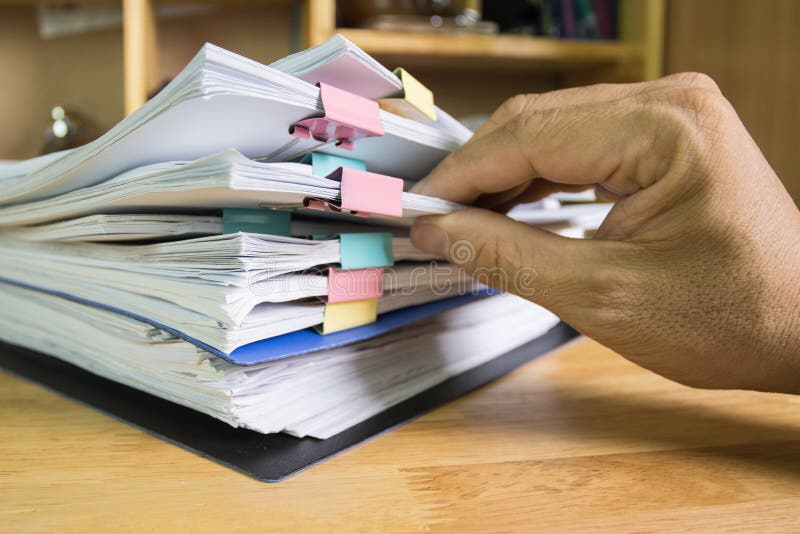 Hand of Man Picked Up the Papers Stock Image - Image of store, picked ...