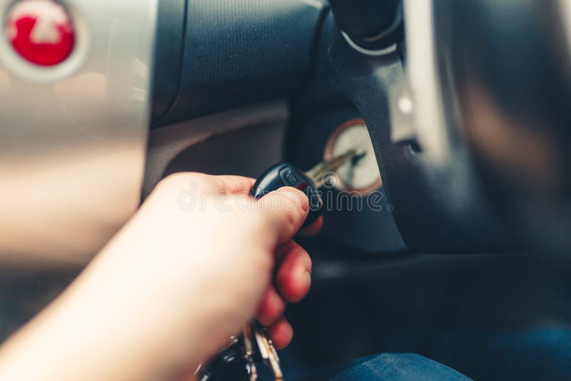 Hand Man Plug in a Key Starting the Engine of a Car. Stock Image ...