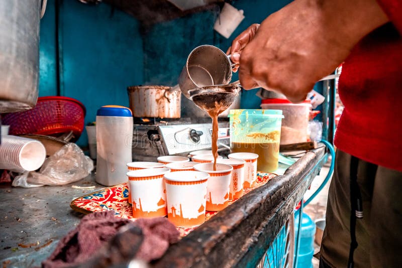 Hand of a Man Pouring Tea in Paper Cups Stock Image - Image of flavor ...