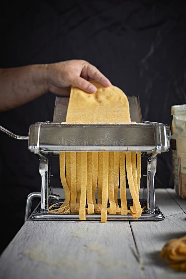 Hand of Man Preparing Pasta Stock Image - Image of gourmet, preparing ...