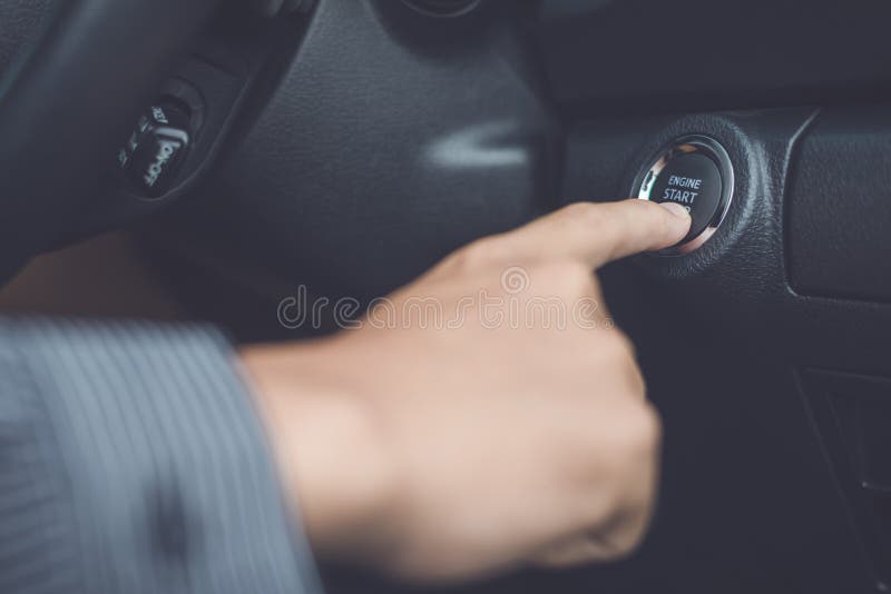 Hand of Man Pressing Button Start/stop Car Engine Inside the Modern Car ...