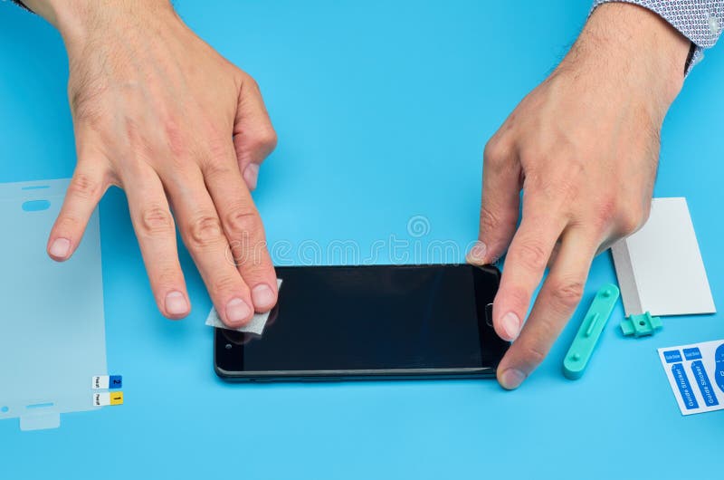 The Man Replacing the Broken Tempered Glass Screen Protector for ...