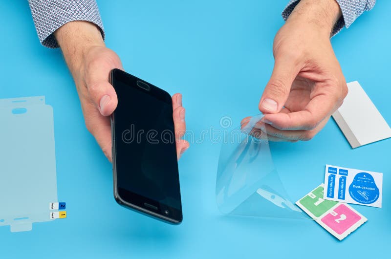 The Man Replacing the Broken Tempered Glass Screen Protector for ...