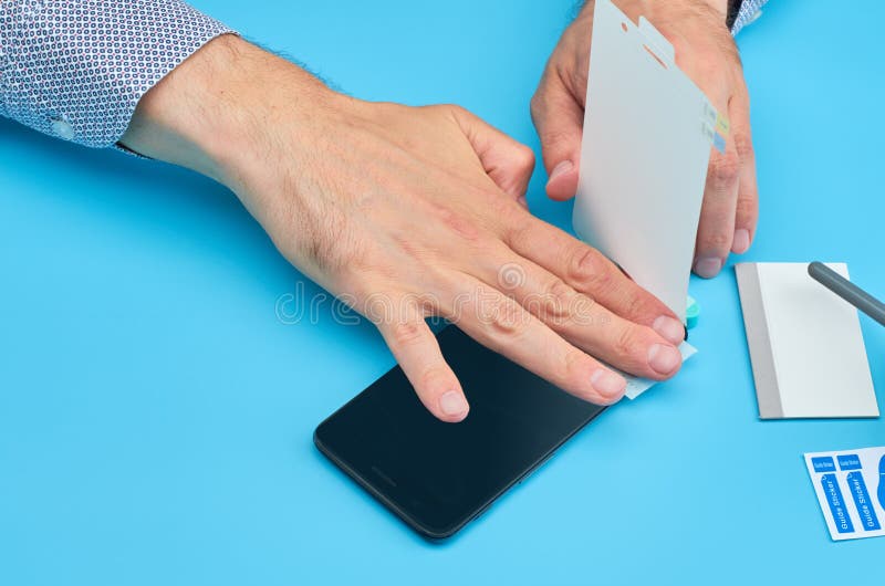 The Man Replacing the Broken Tempered Glass Screen Protector for ...