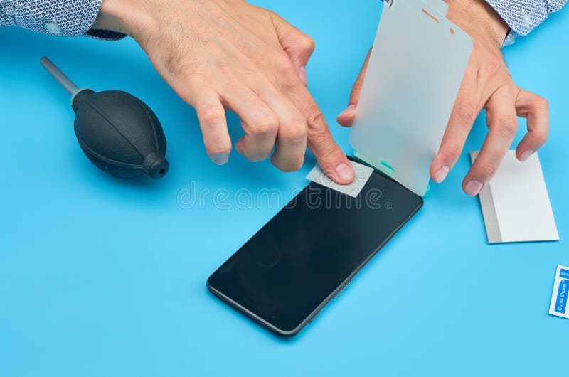 The Man Replacing the Broken Tempered Glass Screen Protector for ...
