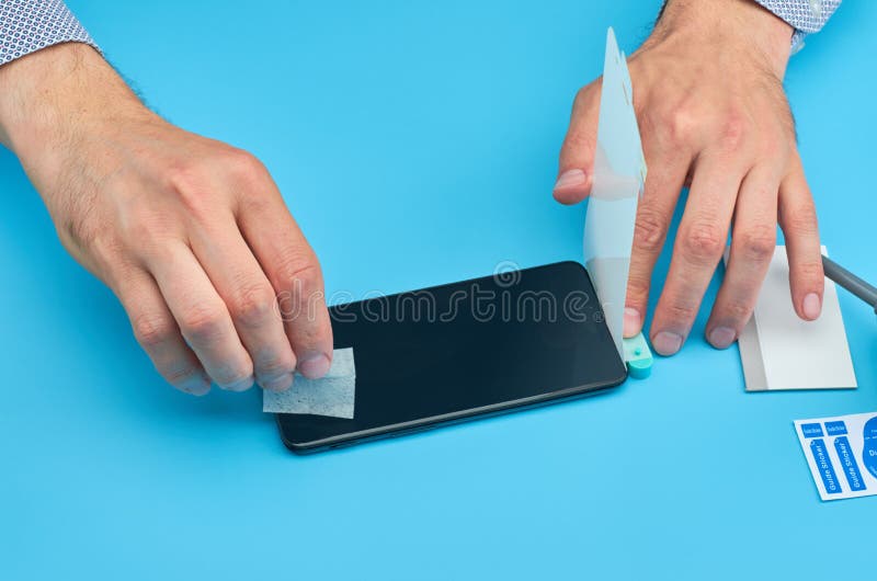The Man Replacing the Broken Tempered Glass Screen Protector for ...