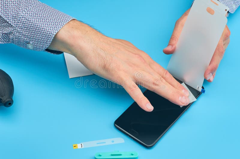 The Man Replacing the Broken Tempered Glass Screen Protector for ...