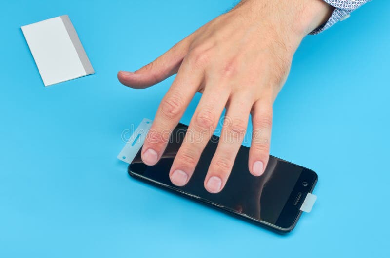 The Man Replacing the Broken Tempered Glass Screen Protector for ...