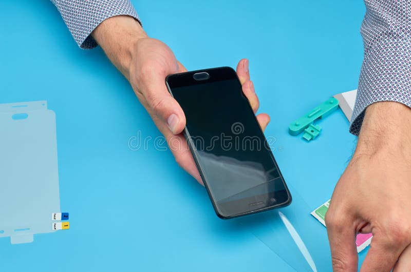 The Man Replacing the Broken Tempered Glass Screen Protector for ...