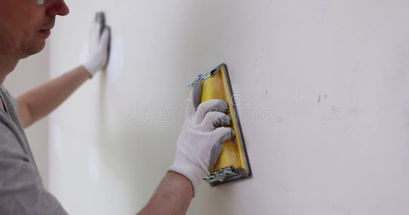 Hand of Man Sanding Wall after Plastering Stock Video - Video of dust ...