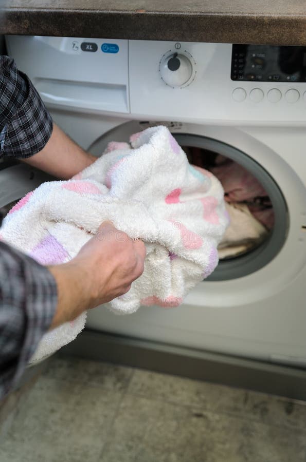 Hand Man Takes Things with the Washing Machine. Stock Image - Image of ...