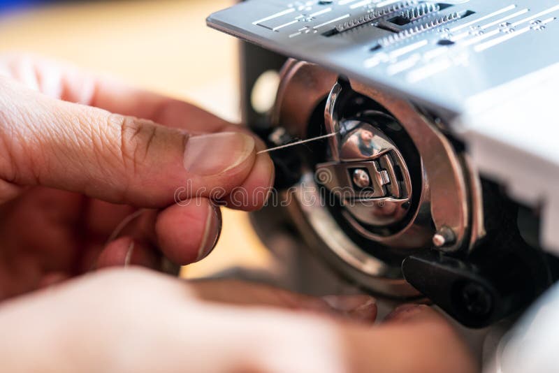 Hand of a Man is Threading a Thread at the Presser Foot Stock Photo ...