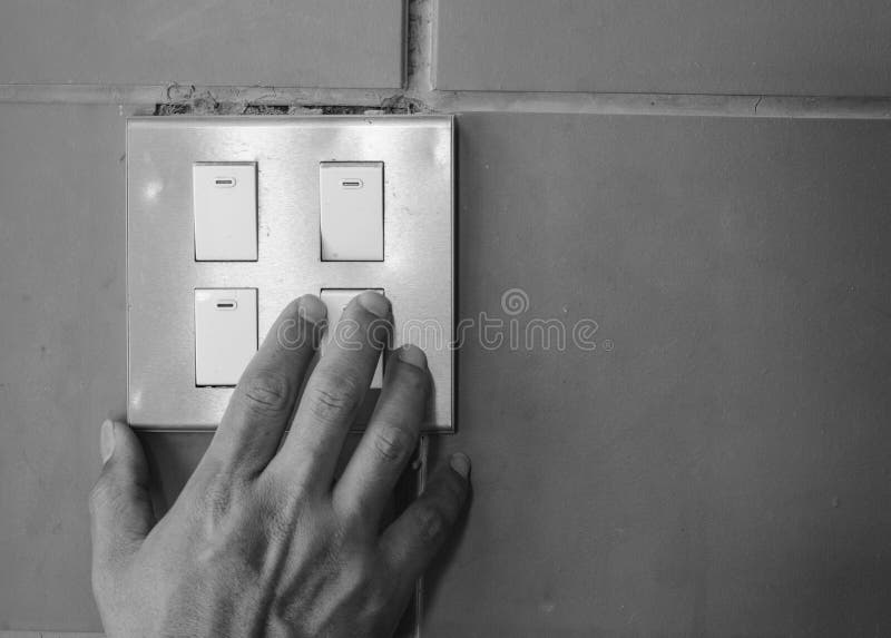 Hand of Man - Turn Off the Power Switch on the Wall. Stock Photo ...