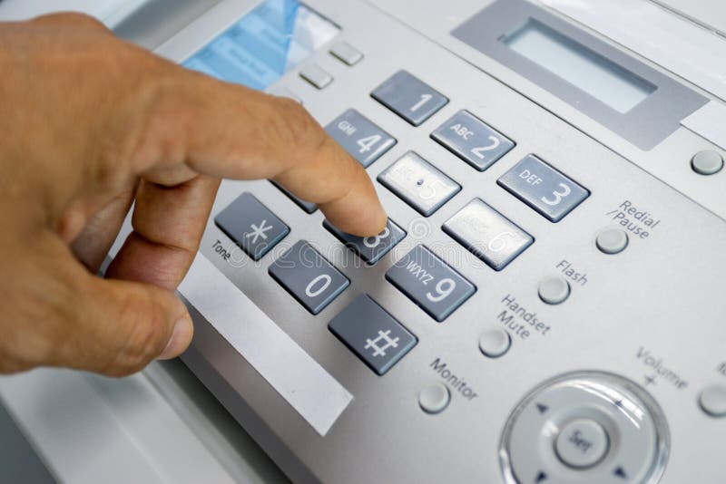 Hand Man are Using a Fax Machine in the Office, Equipment for Data ...
