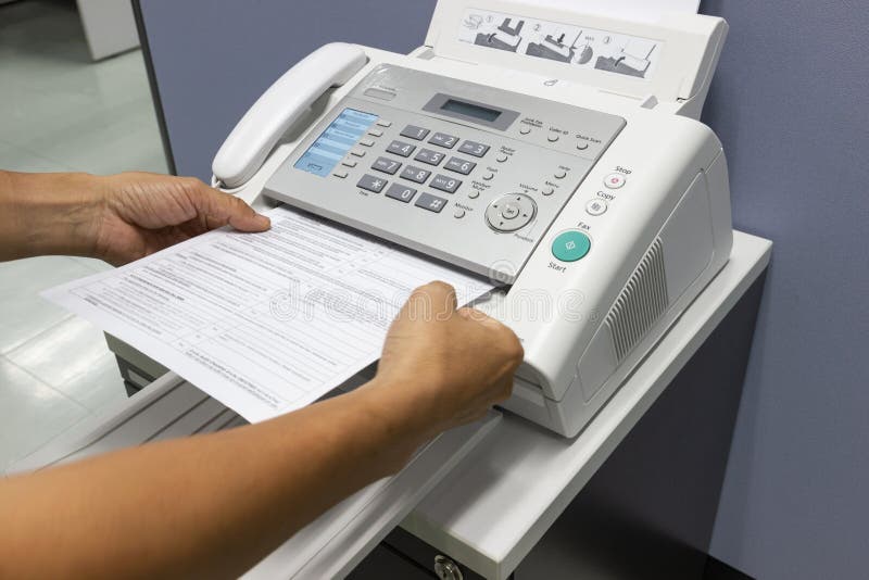 Hand Man are Using a Fax Machine in the Office Stock Photo - Image of ...