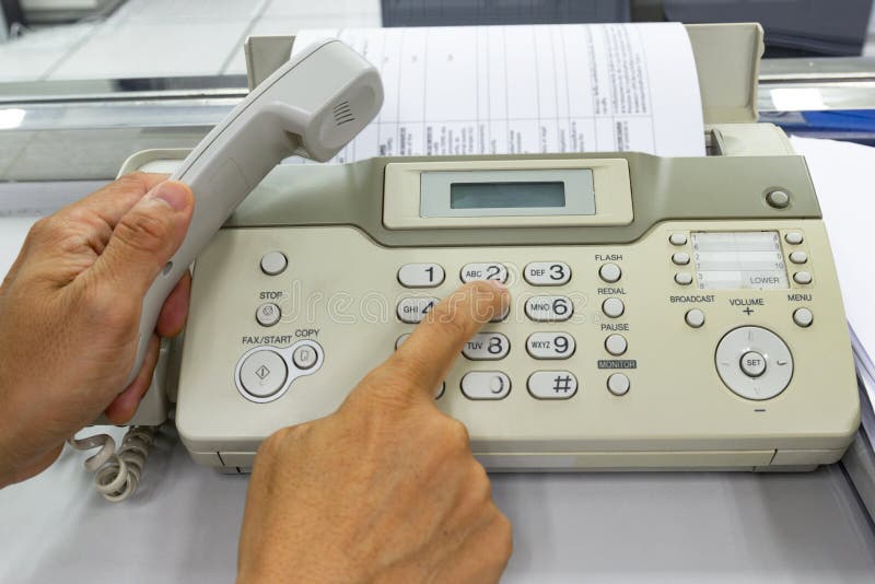 Hand Man are Using a Fax Machine Send Paper in the Office Stock Photo ...