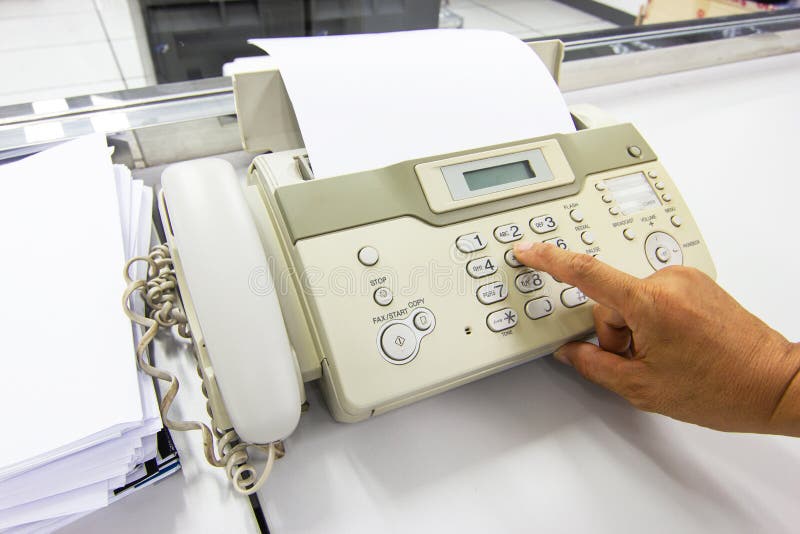 Hand Man are Using a Fax Machine Send Paper in the Office Stock Image ...