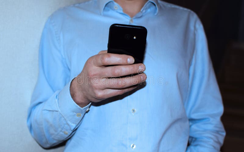 Hand of Man Using Smartphone Stock Photo - Image of game, formal: 112858156