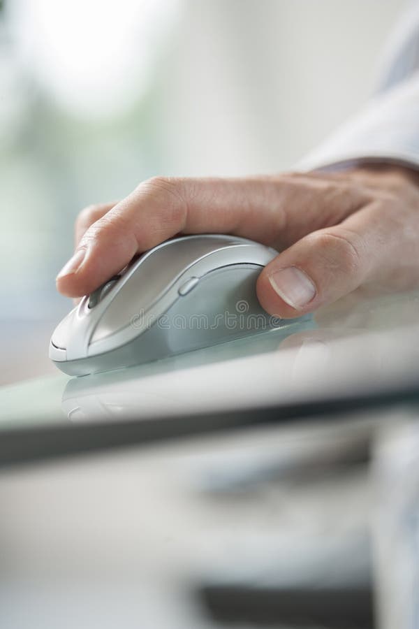 Hand of Man Using His Forefinger To Control a Cordless Mouse Stock ...