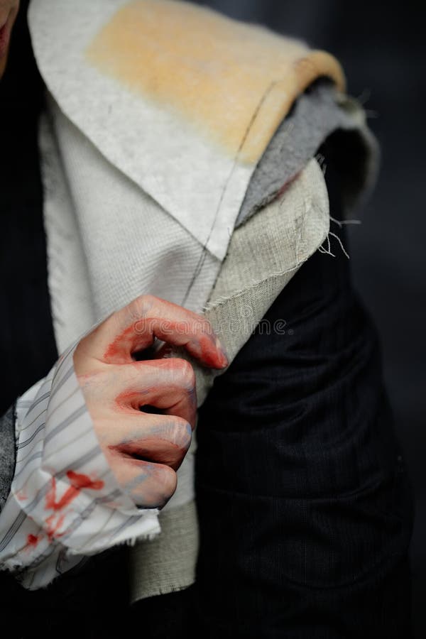 Hand of Man Wearing Padded Shoulder Jacket in Patchwork Design in ...