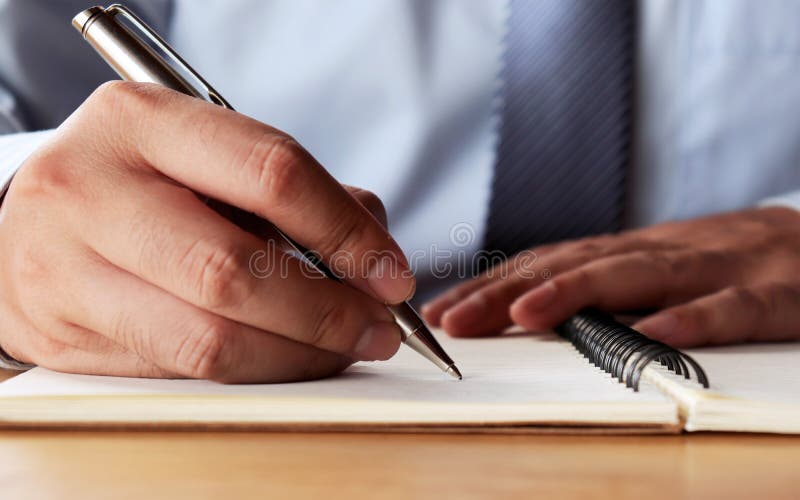 The Hand of the Man Who Wrote the Book Stock Photo - Image of contract ...