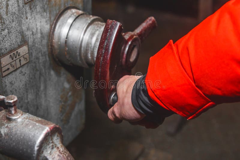 The Hand of a Man Worker in a Suit Controls the Milling Machine by the ...