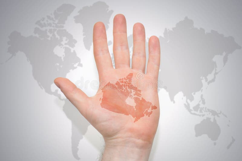 Hand with Map of Canada on the Gray World Map Background Stock Photo ...
