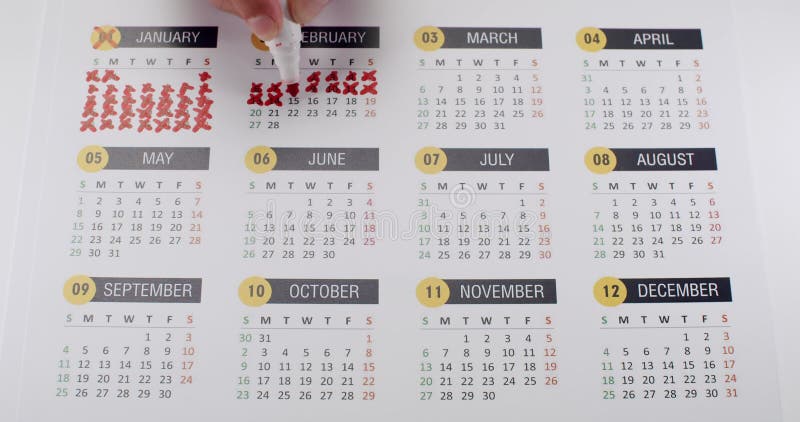 Hand Marking Dates on Calendar with Pen - Planning and Scheduling ...