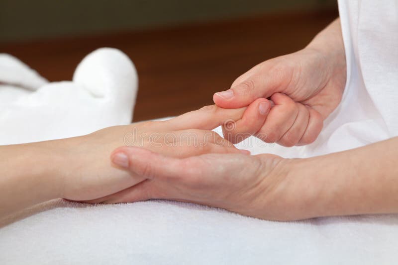 Hand massage stock image. Image of massaging, fingers - 70558387
