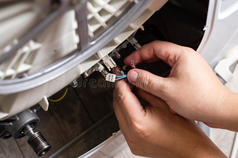 The Hand of the Master Removes the Electrical Chips To Remove the ...